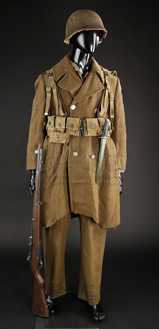 A background U.S. infantry uniform with prop rifle from David Ayer’s ...