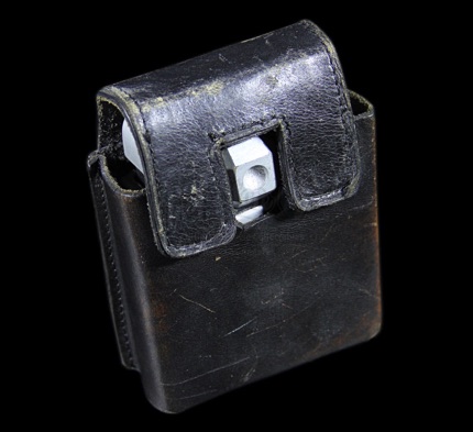 A prop hand scanner with belt pouch from Star Trek: Enterprise. A ...