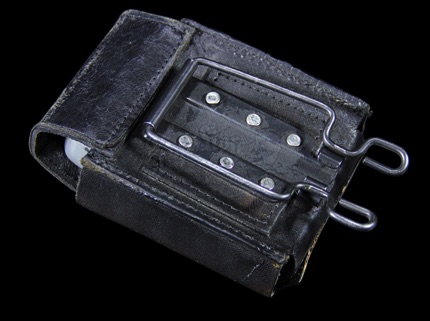 A prop hand scanner with belt pouch from Star Trek: Enterprise. A ...