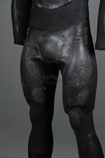 Finished in traditional matte black, thebatsuit was altered by the ...