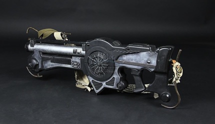 Well-used with some paint wear and damage to the fins on the rifle’s ...