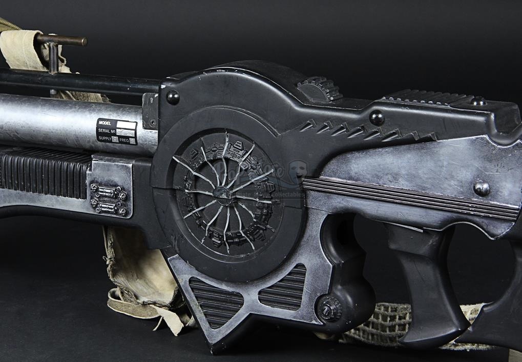 Well-used with some paint wear and damage to the fins on the rifle’s ...